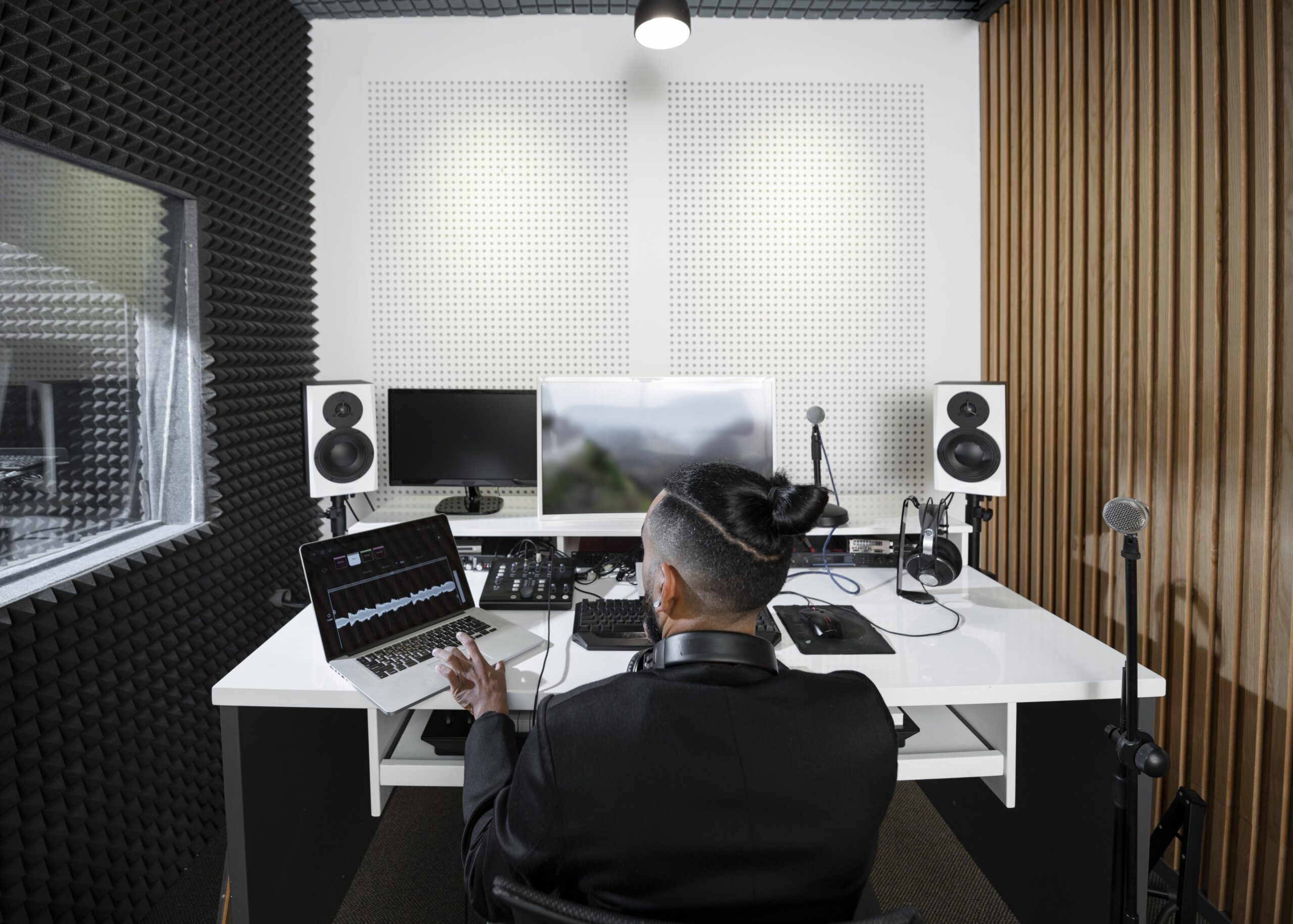 back-view-man-working-radio-station - Internet Tips & Tricks